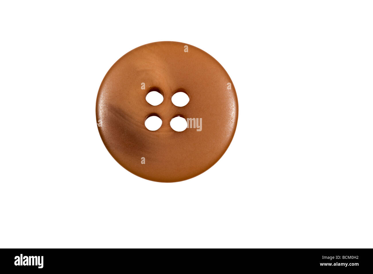 Reddish brown coloured button Stock Photo - Alamy