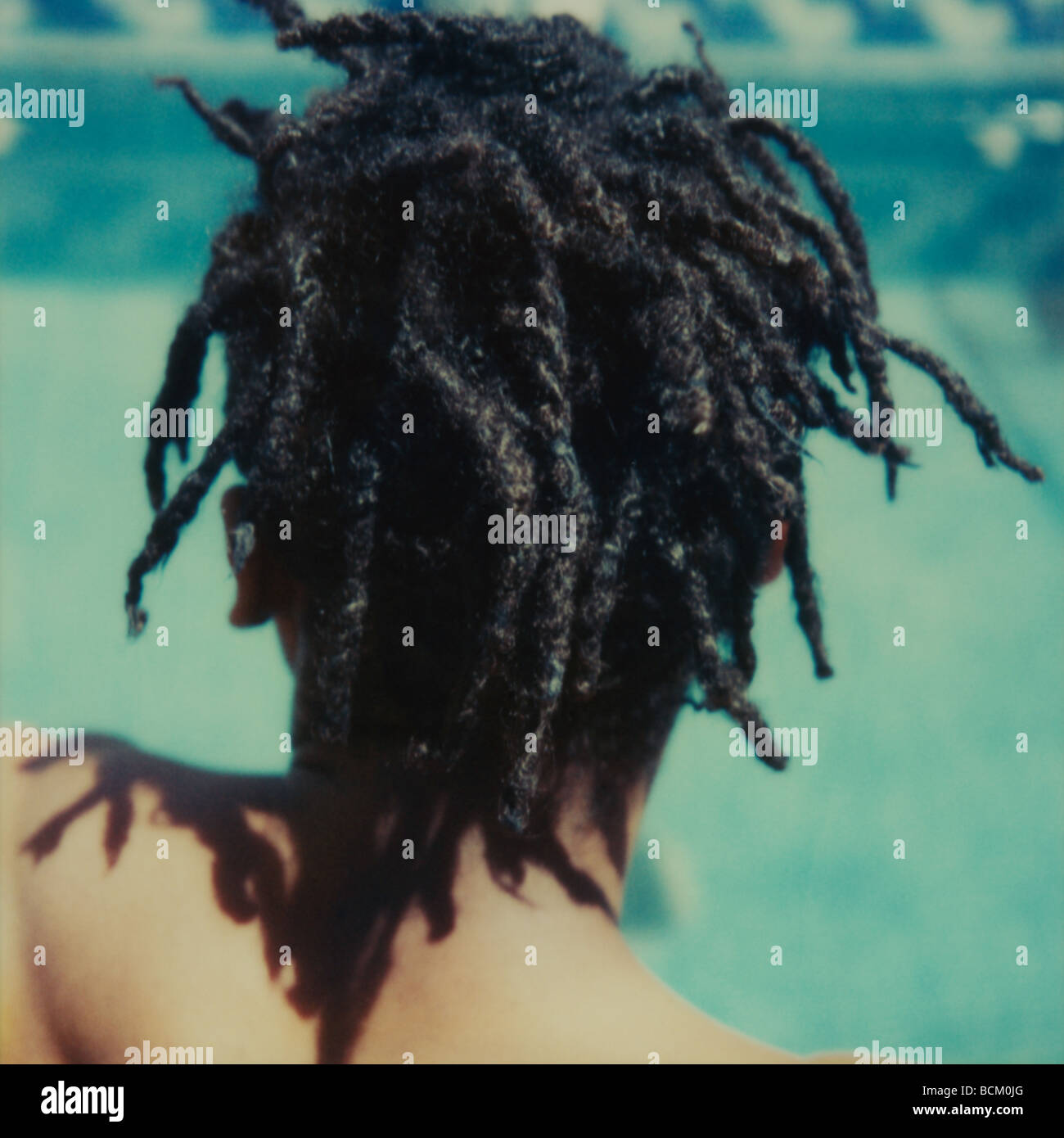 Man with dreadlocks, head and shoulders, rear view Stock Photo - Alamy