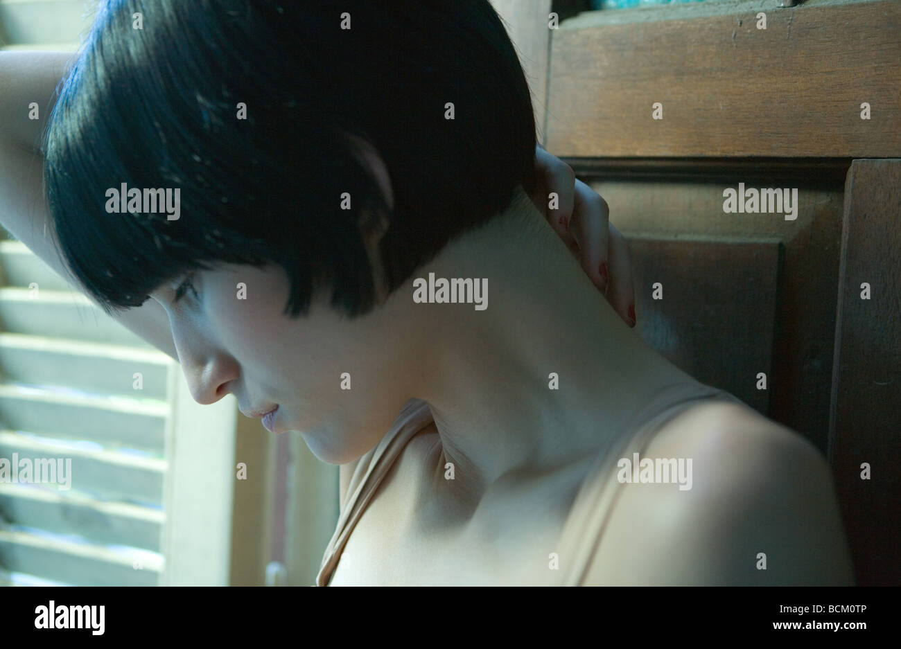 Back view with head turned to side hi-res stock photography and images ...