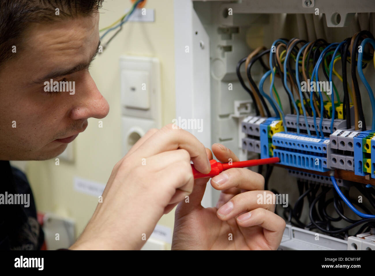 Electrician at work Stock Photo - Alamy