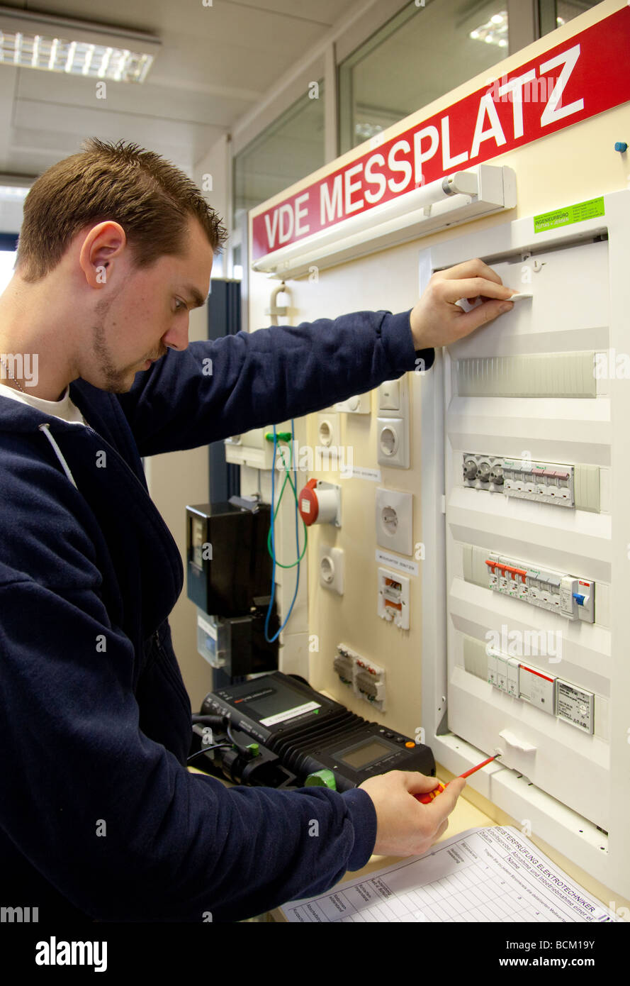 Electrician at work Stock Photo - Alamy