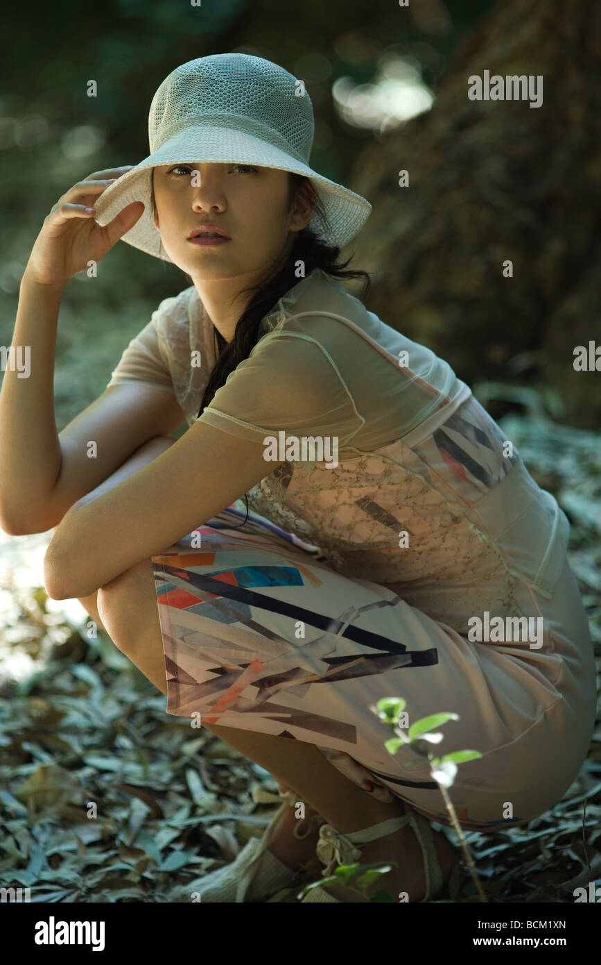 Woman head down crouching hi-res stock photography and images - Alamy