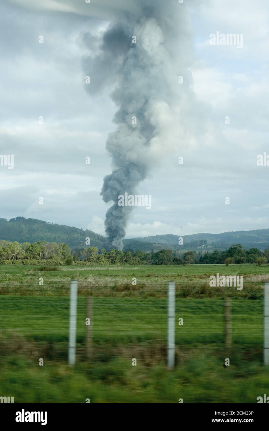 Smoke in countryside Stock Photo - Alamy