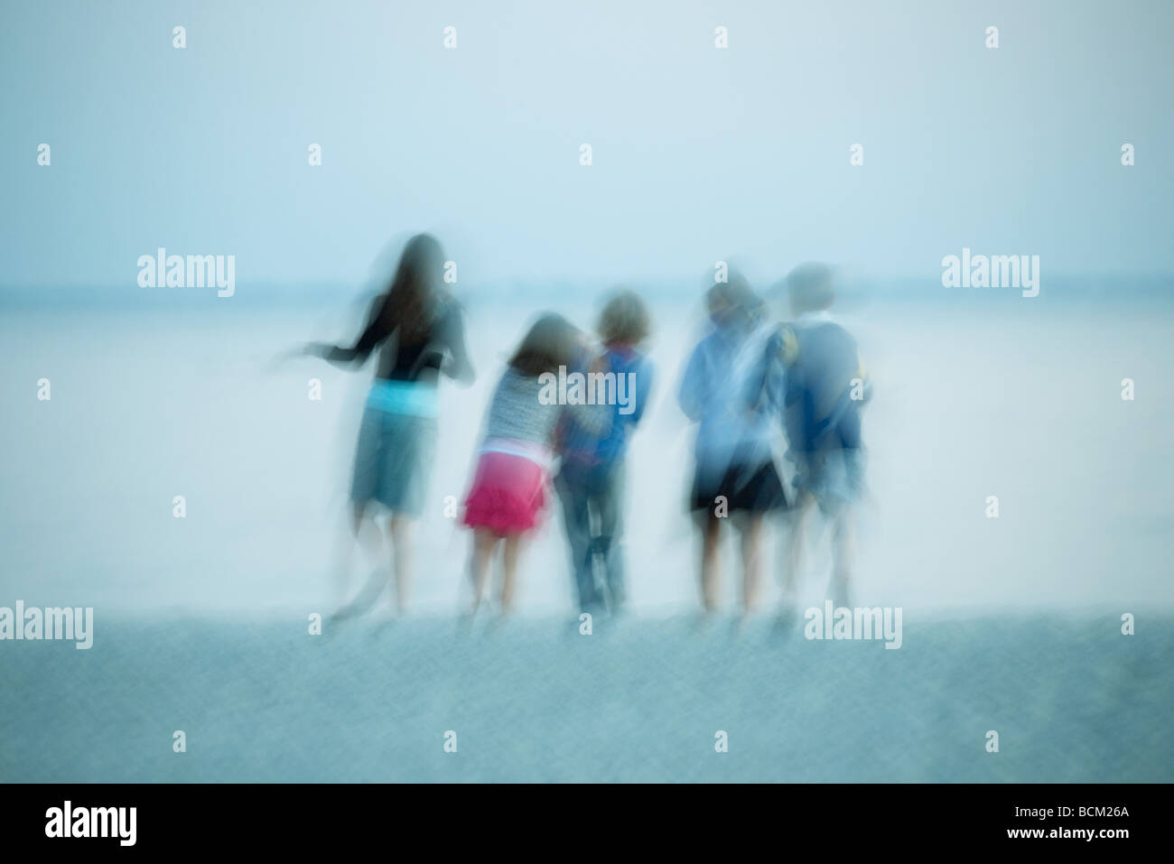 Group of children walking side by side, rear view, defocused Stock ...
