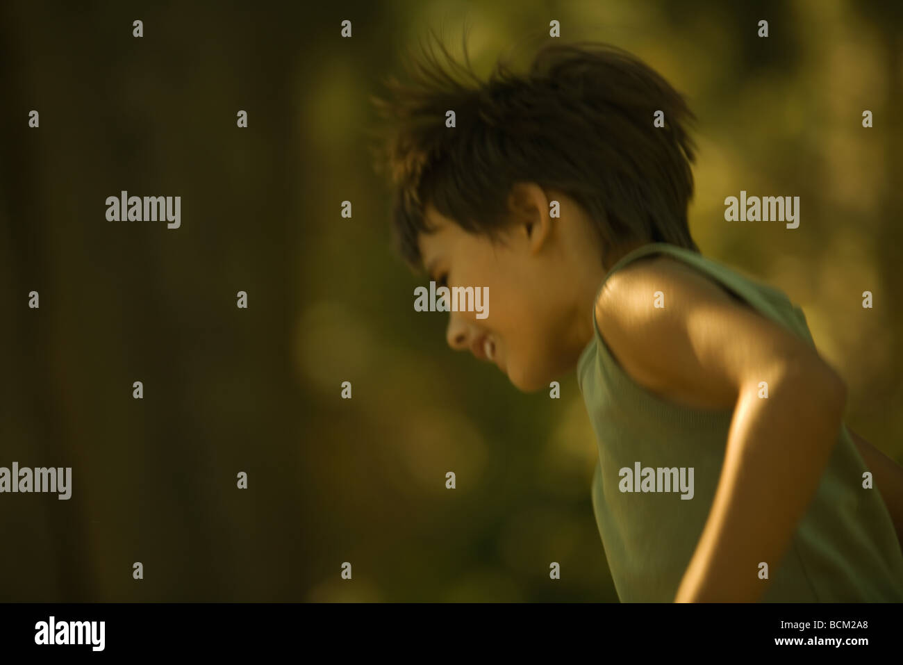 Little boy running outdoors, side view, blurred motion Stock Photo - Alamy