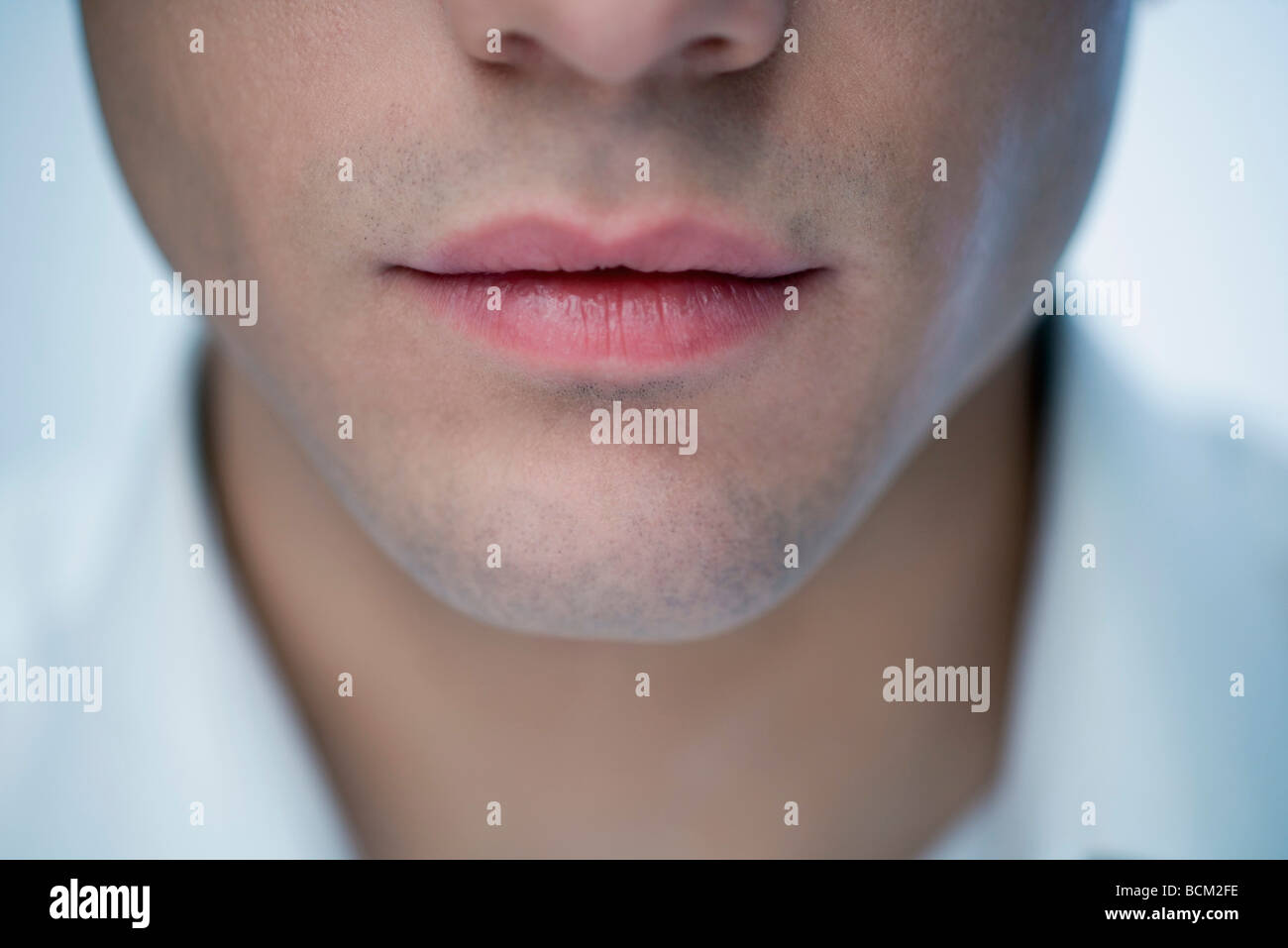 Young man's mouth, close-up Stock Photo - Alamy