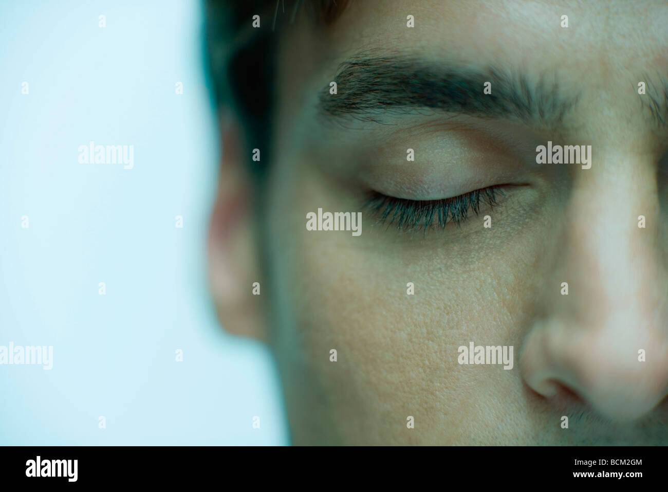 Man with eyes closed, extreme close-up Stock Photo - Alamy