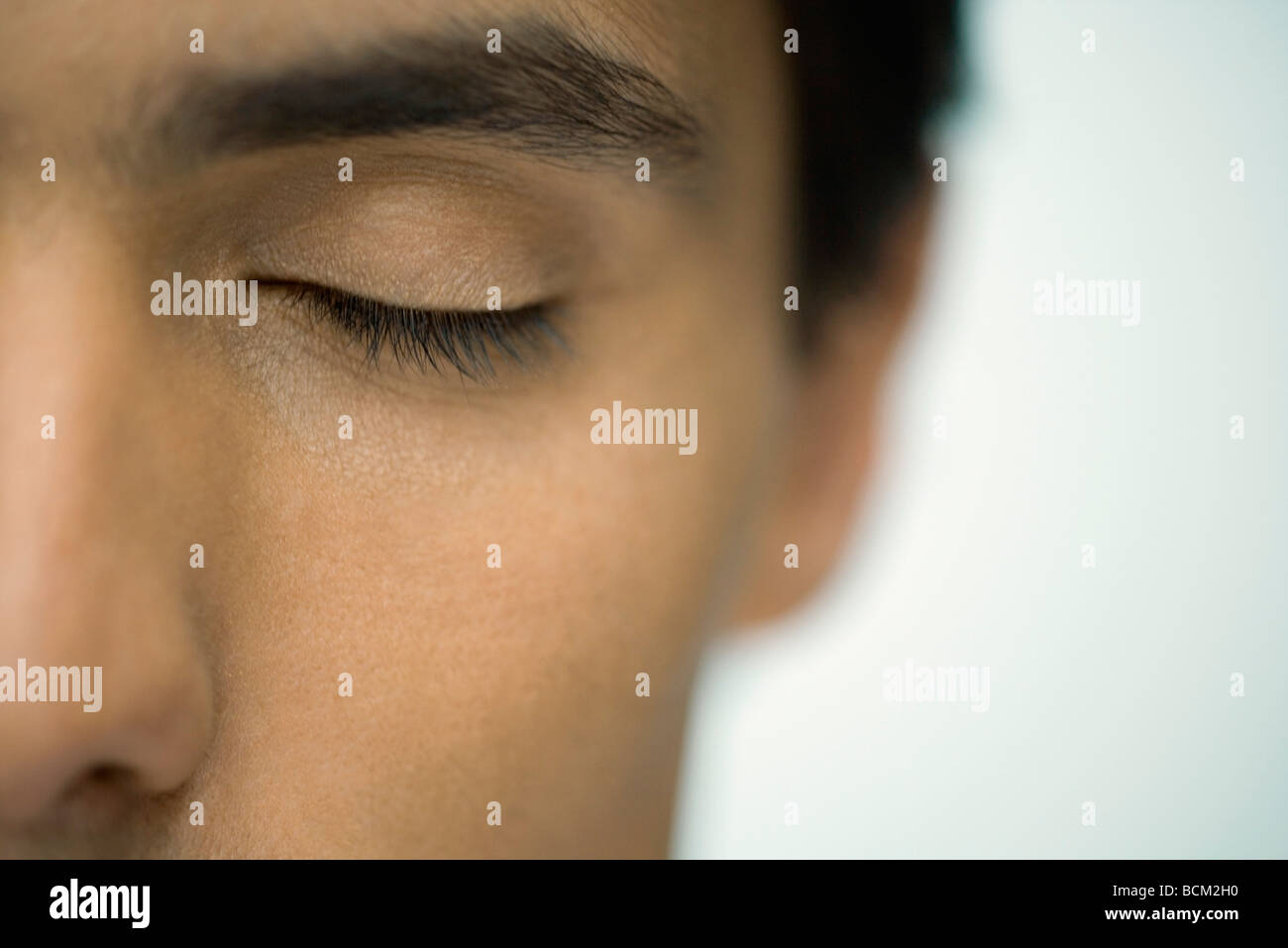 Half Closed Eyes High Resolution Stock Photography and Images - Alamy
