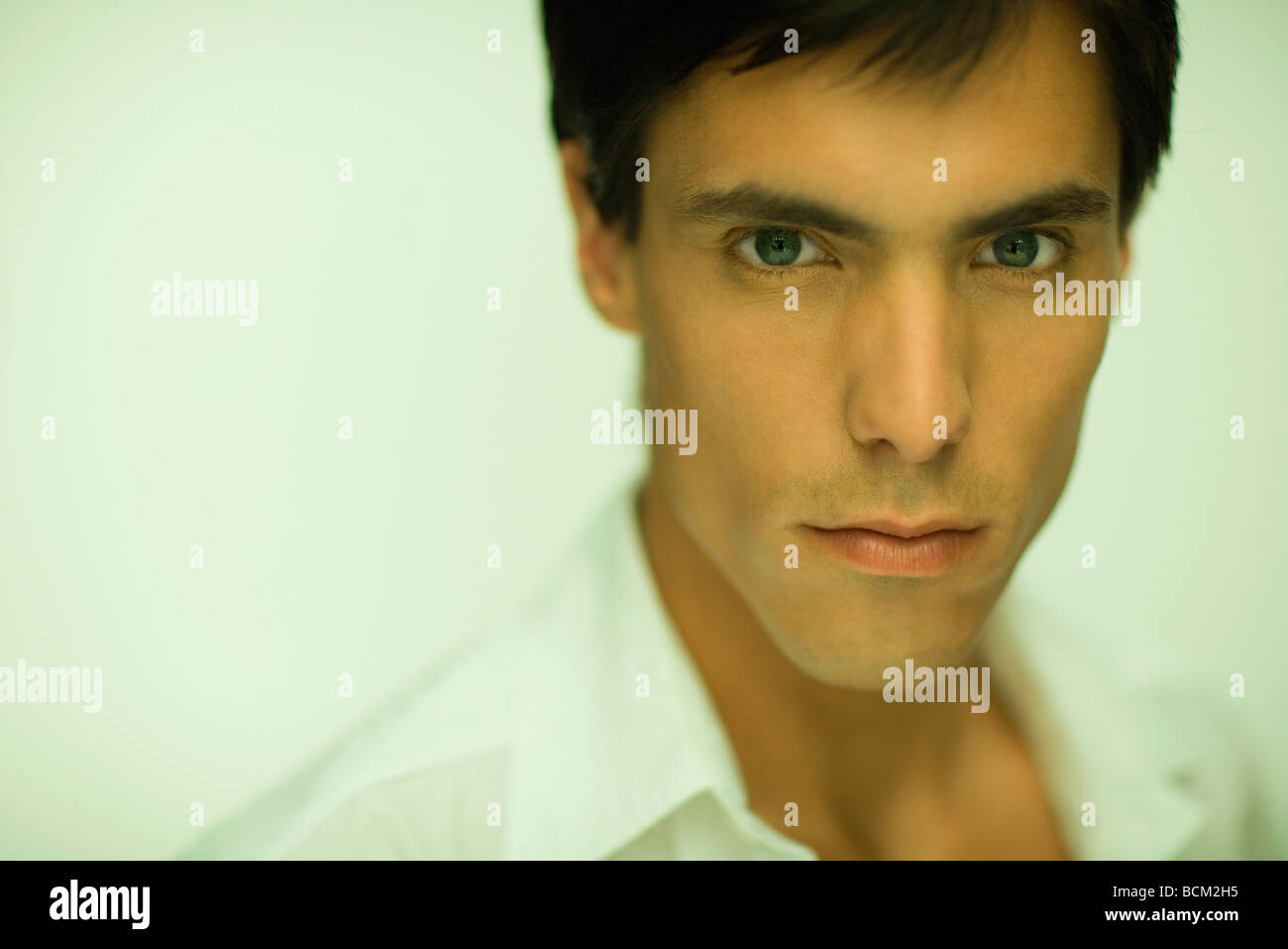 Young latin man staring camera hi-res stock photography and images - Alamy