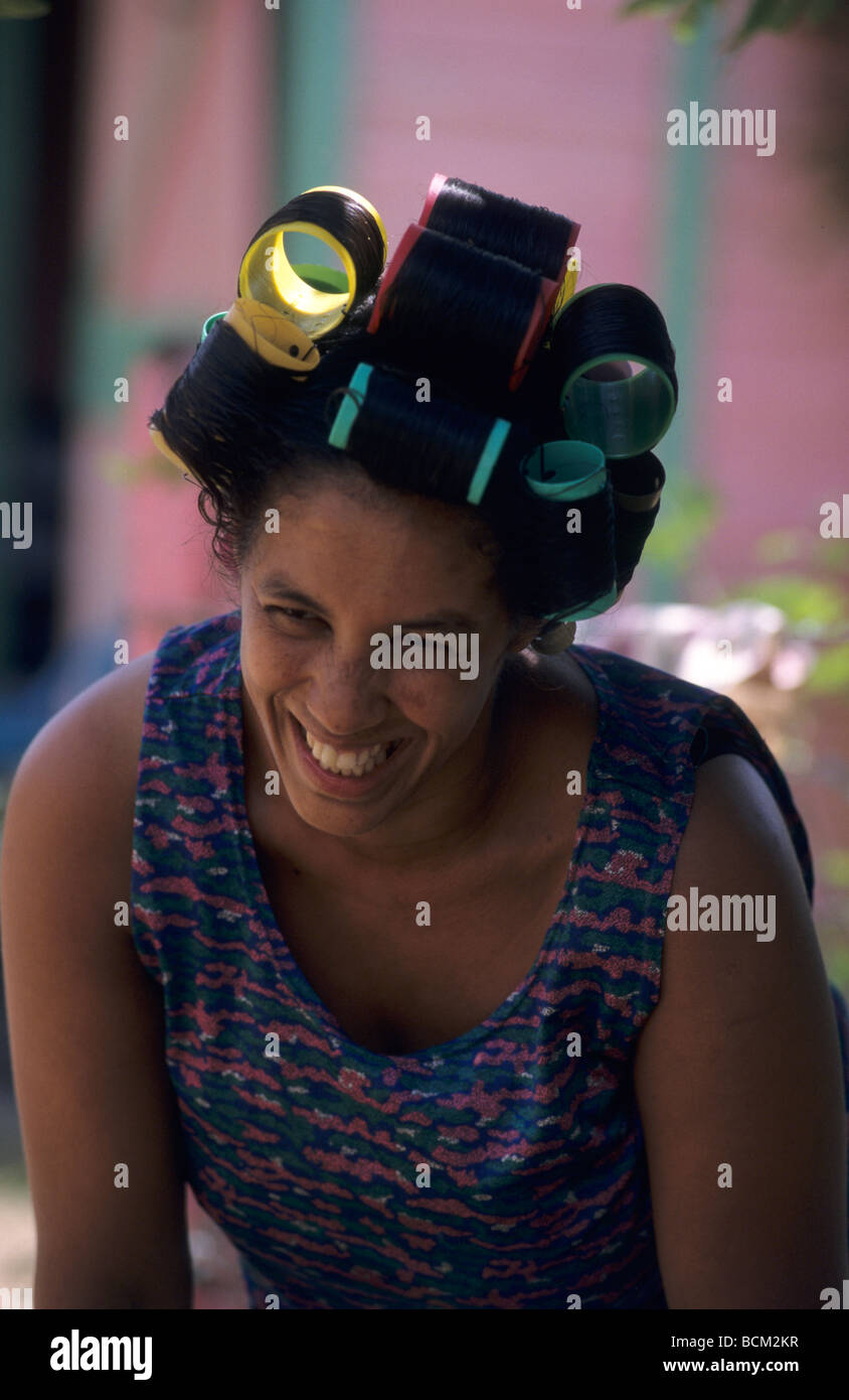 Local woman portrait during hairdressing. Dominican Republic Island ...