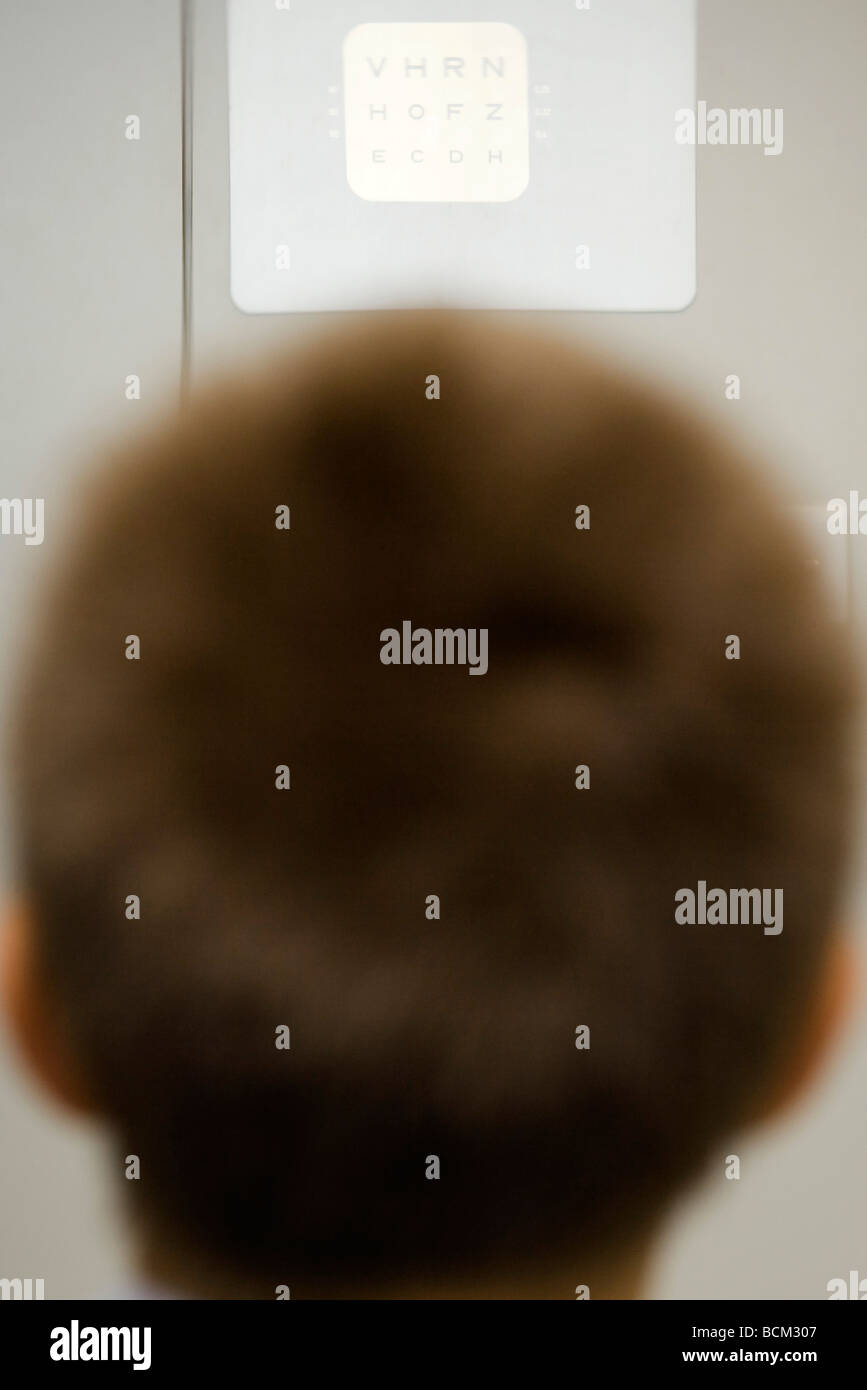 Person looking at eye chart, rear view Stock Photo: 25027639 - Alamy