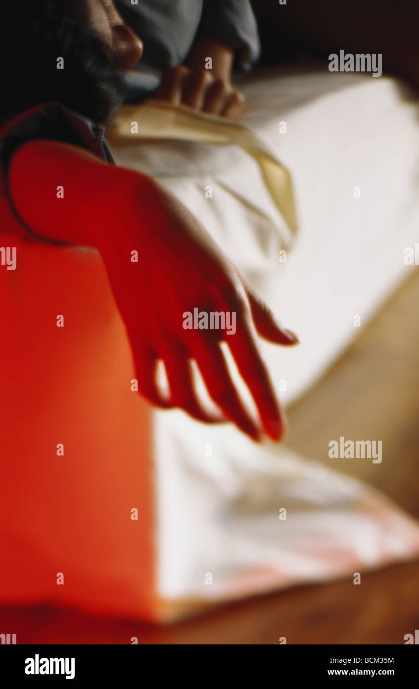 Hand Hanging Off Bed