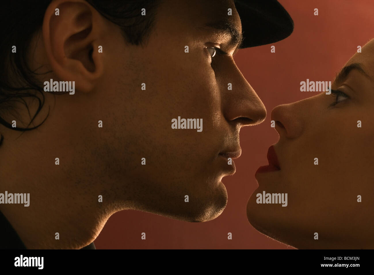 Couple face to face, looking at each other, profile, close-up Stock ...
