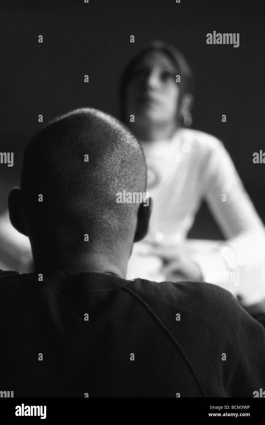 Back facing each other Black and White Stock Photos & Images - Alamy