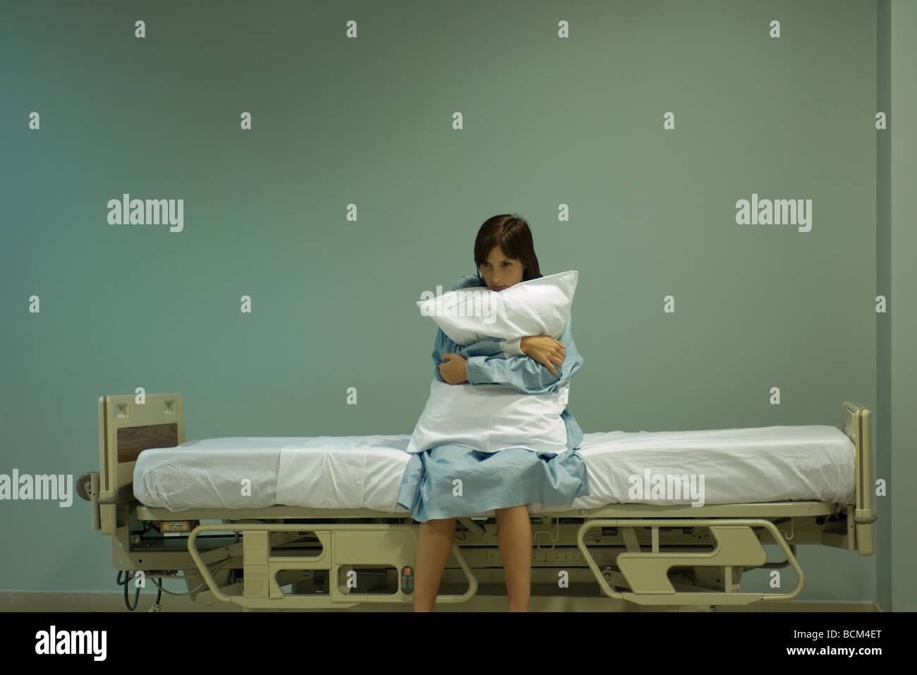 Patient gown folded hi-res stock photography and images - Alamy