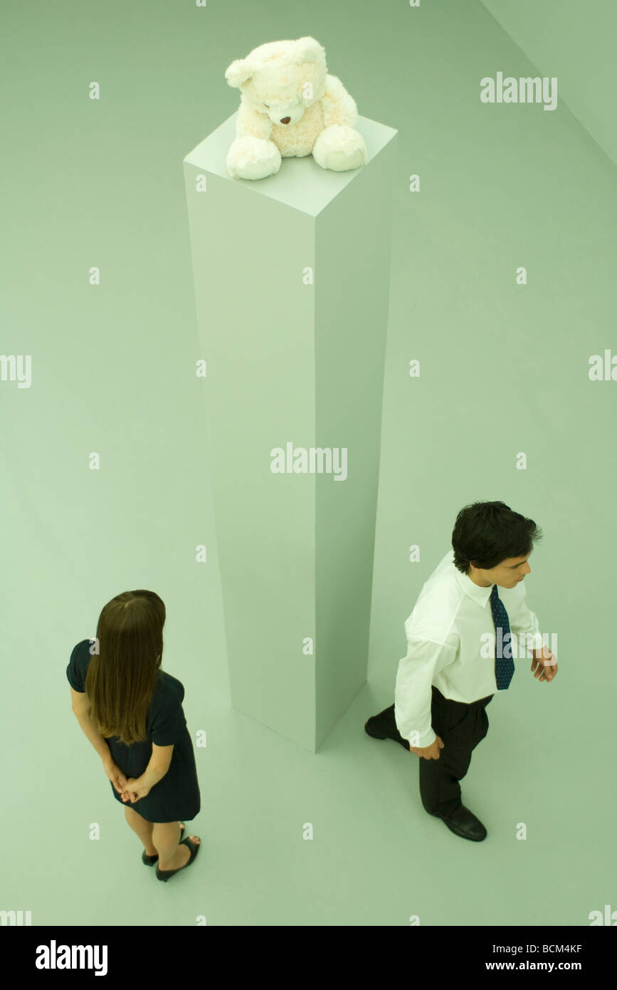 Young woman on white pedestal hi-res stock photography and images - Alamy