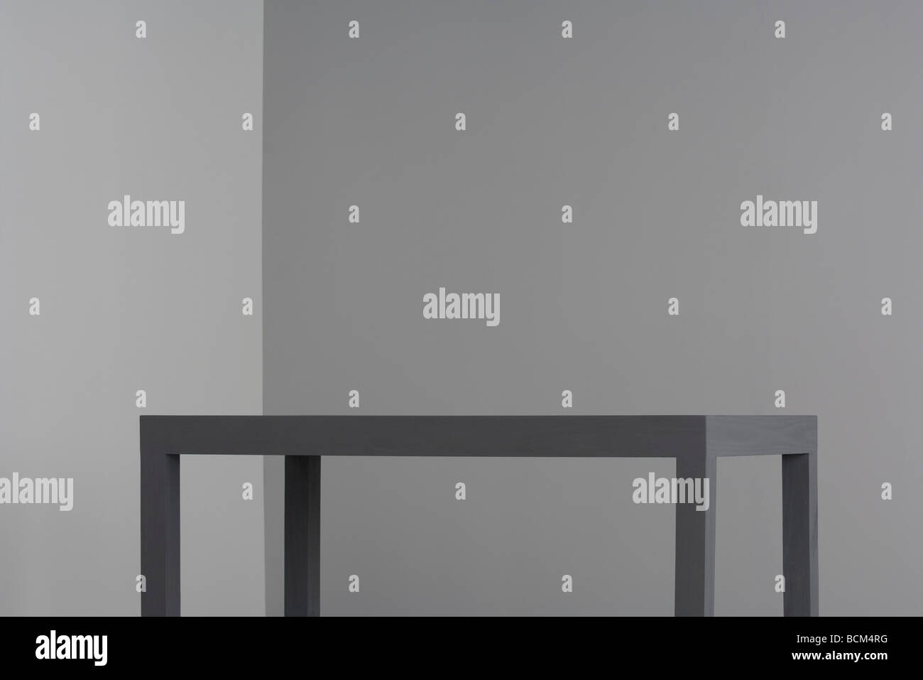 Gray table and gray background Stock Photo - Alamy