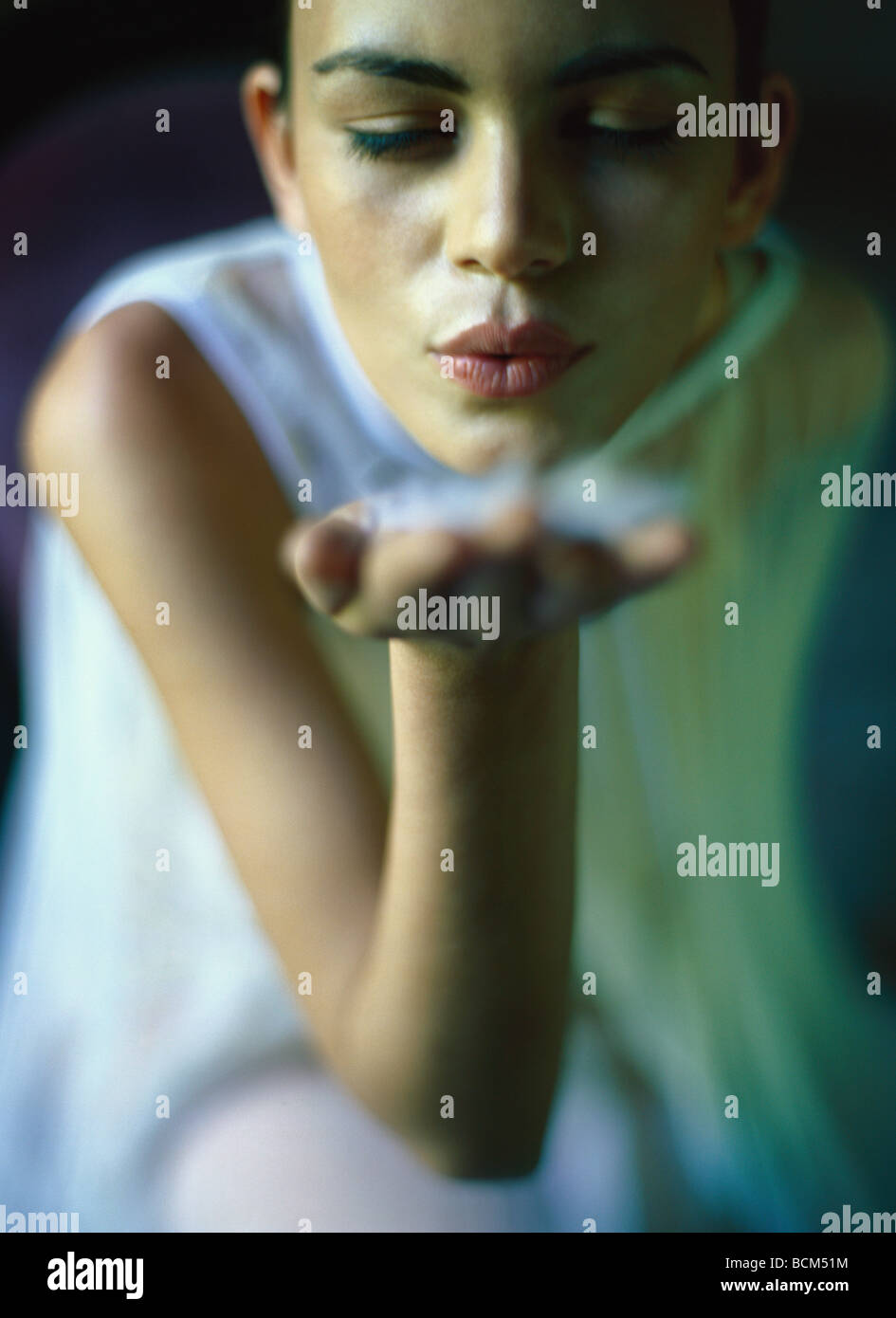 Hand And Feather High Resolution Stock Photography and Images - Alamy