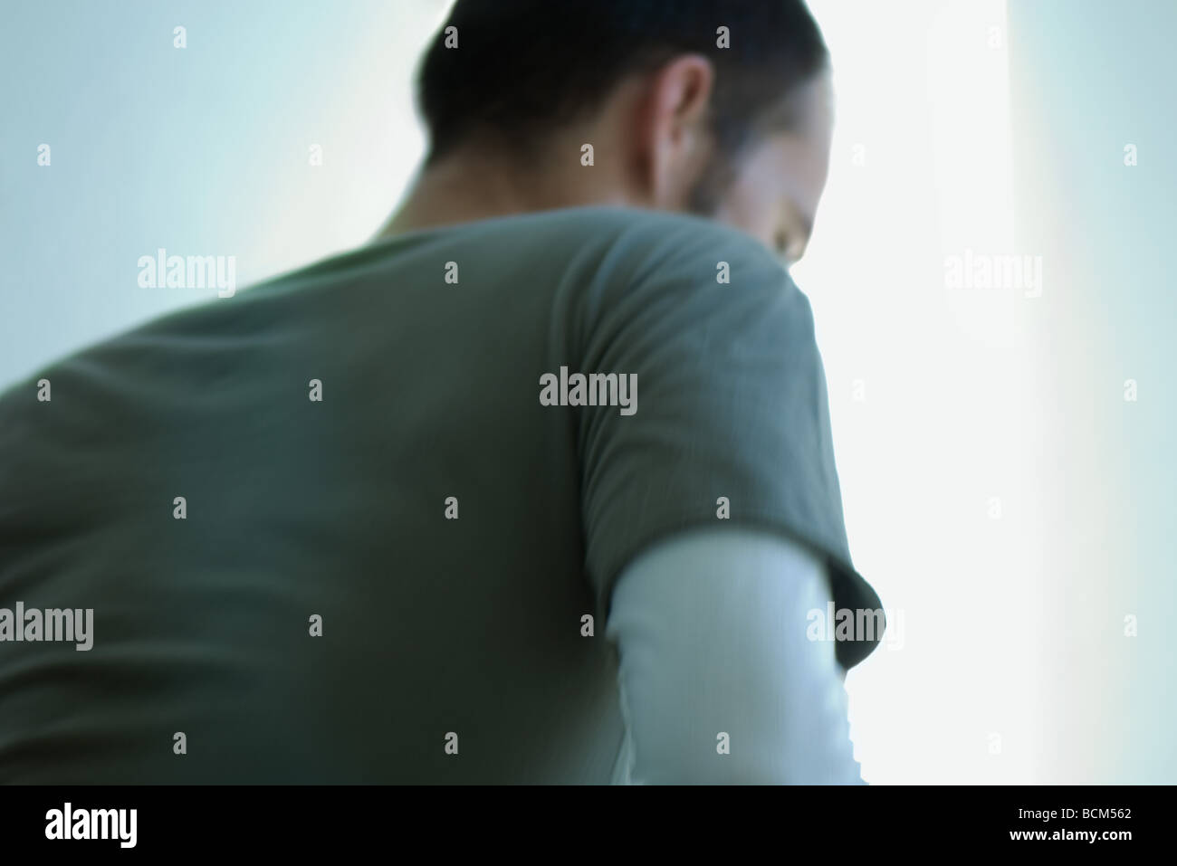 Man looking away, rear view Stock Photo - Alamy