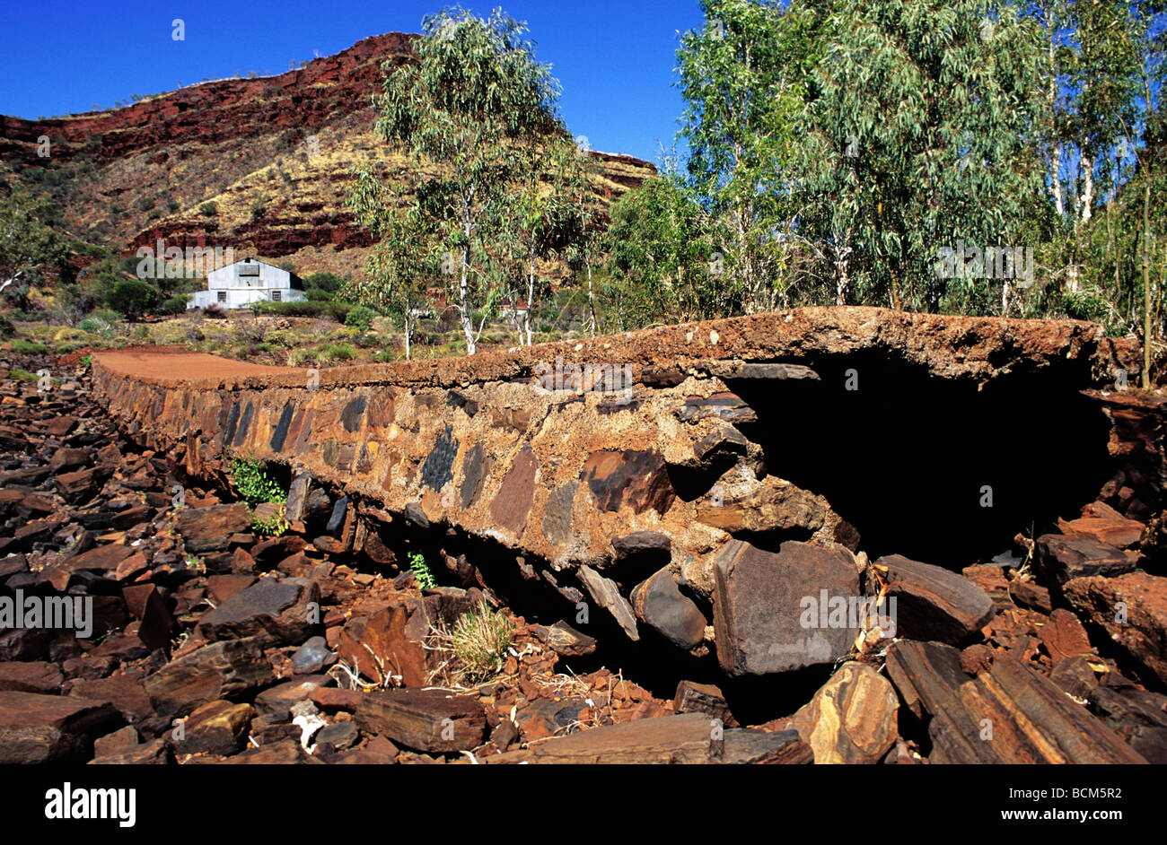 Damaged Mine Road once the entrance to the now abandoned Wittenoom ...