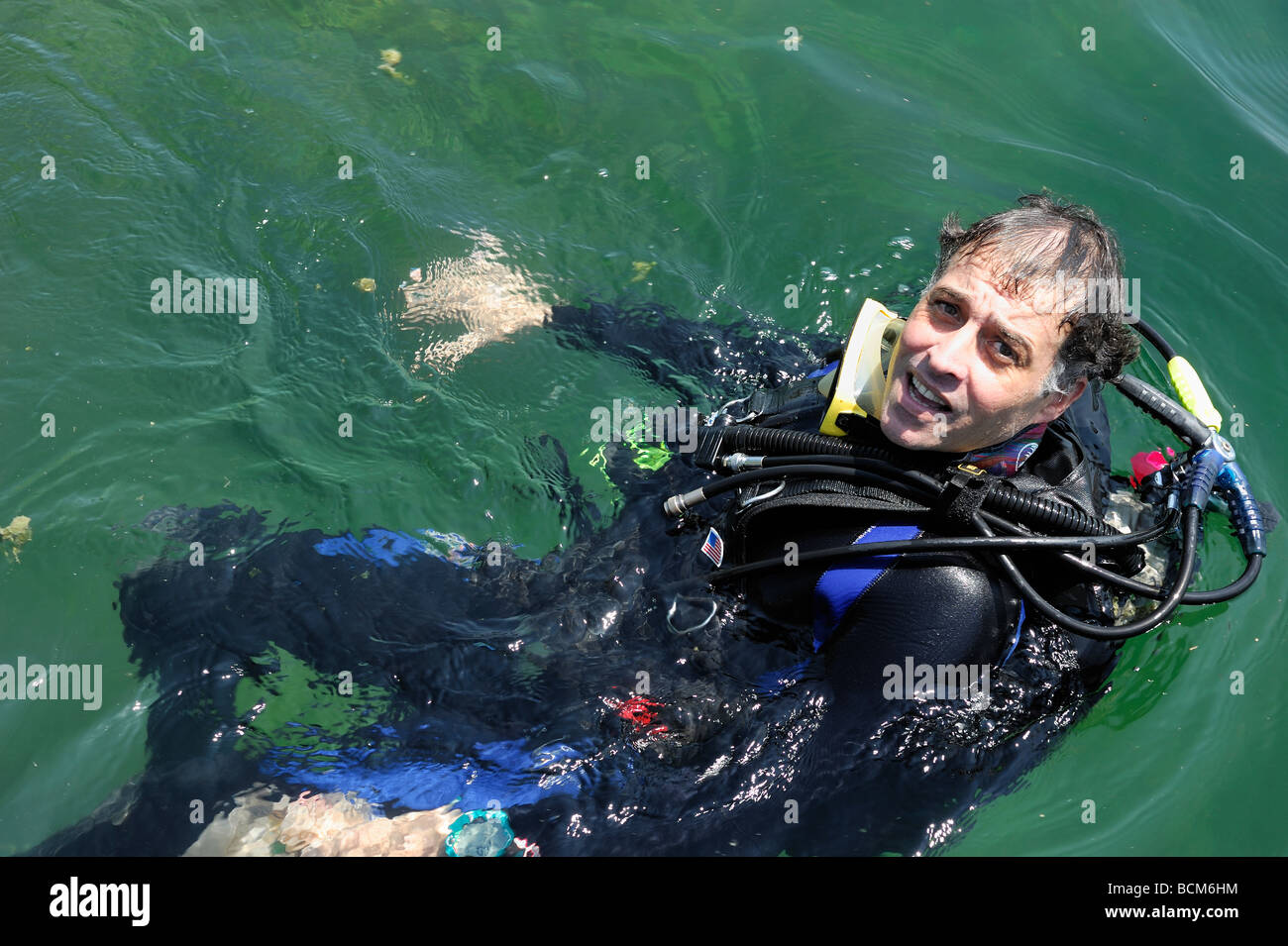 A man scuba diver swimming in Clear Spring lake Texas Stock Photo - Alamy