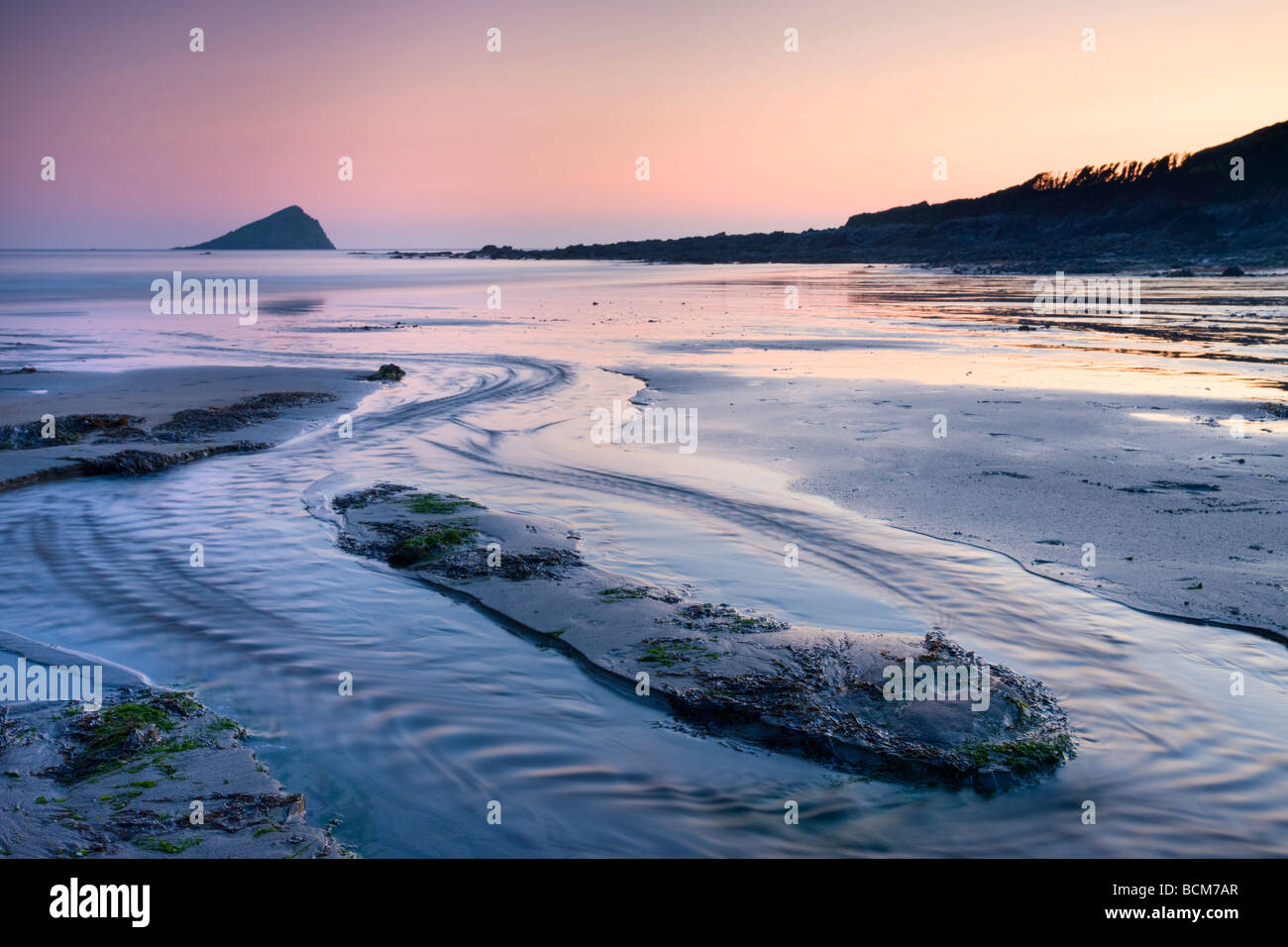 Wembury Bay and the Great Mewstone at sunset Wembury Devon England ...