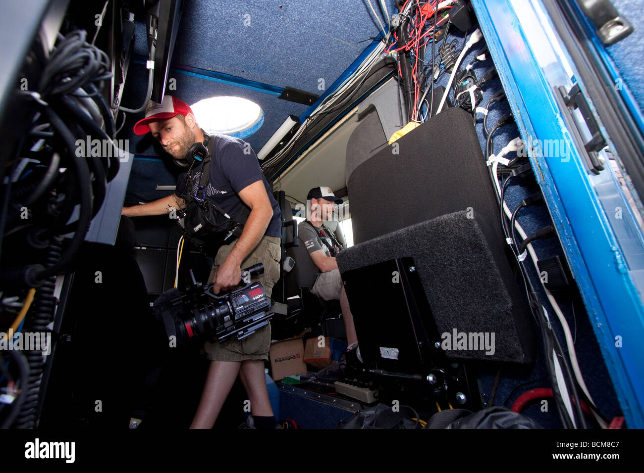 A Discovery Channel videographer inside the Doppler on Wheels truck in ...