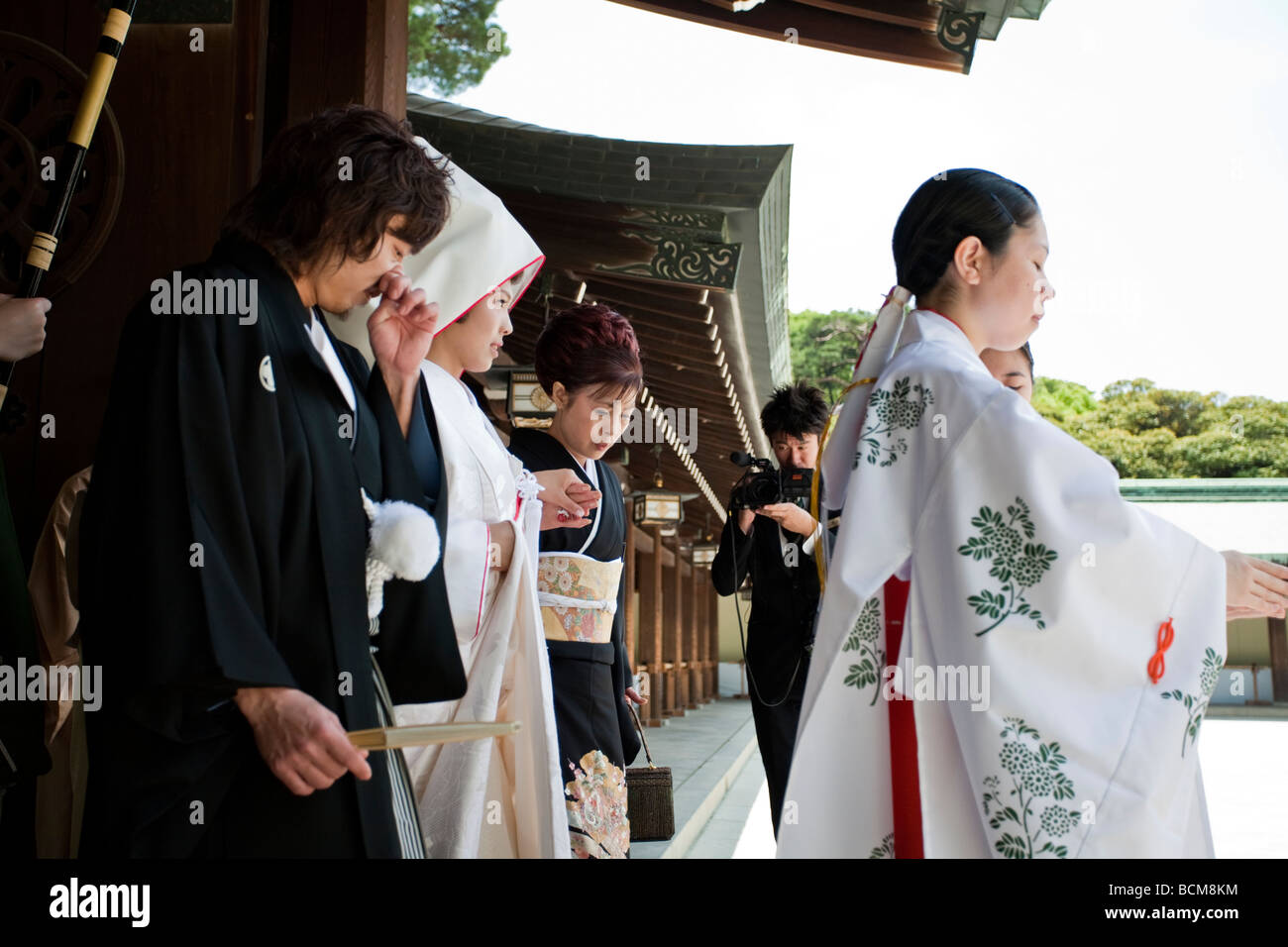 At traditional japanese shinto wedding ceremony at meiji jingu shrine ...