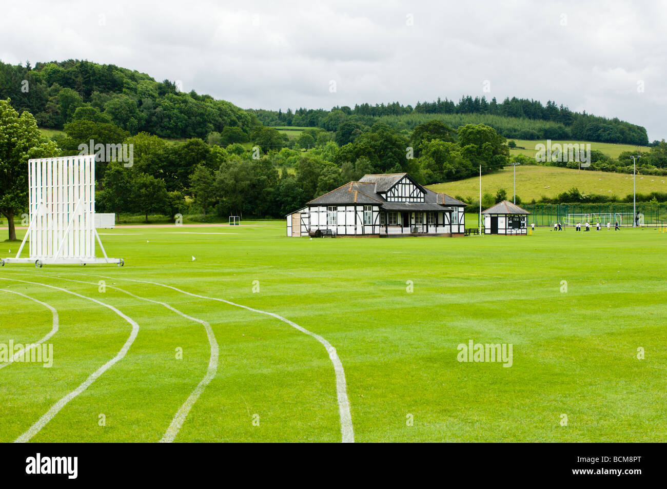 Playing fields and pavilion at Christ College school in Brecon Stock ...