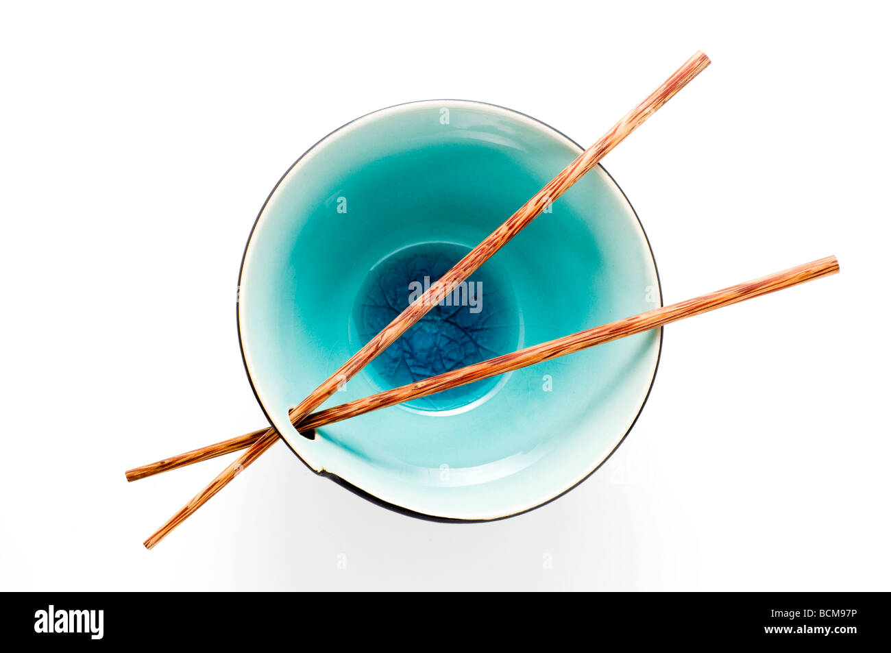 empty rice bowl with chopsticks Stock Photo - Alamy