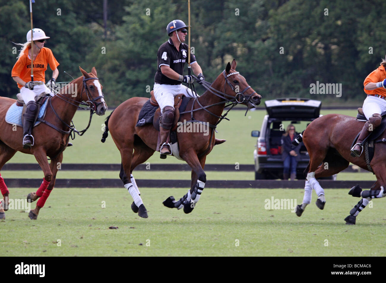 Riders playing polo Stock Photo - Alamy