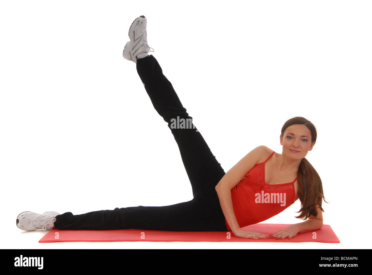 young happy woman doing fitness isolated on white background Stock ...