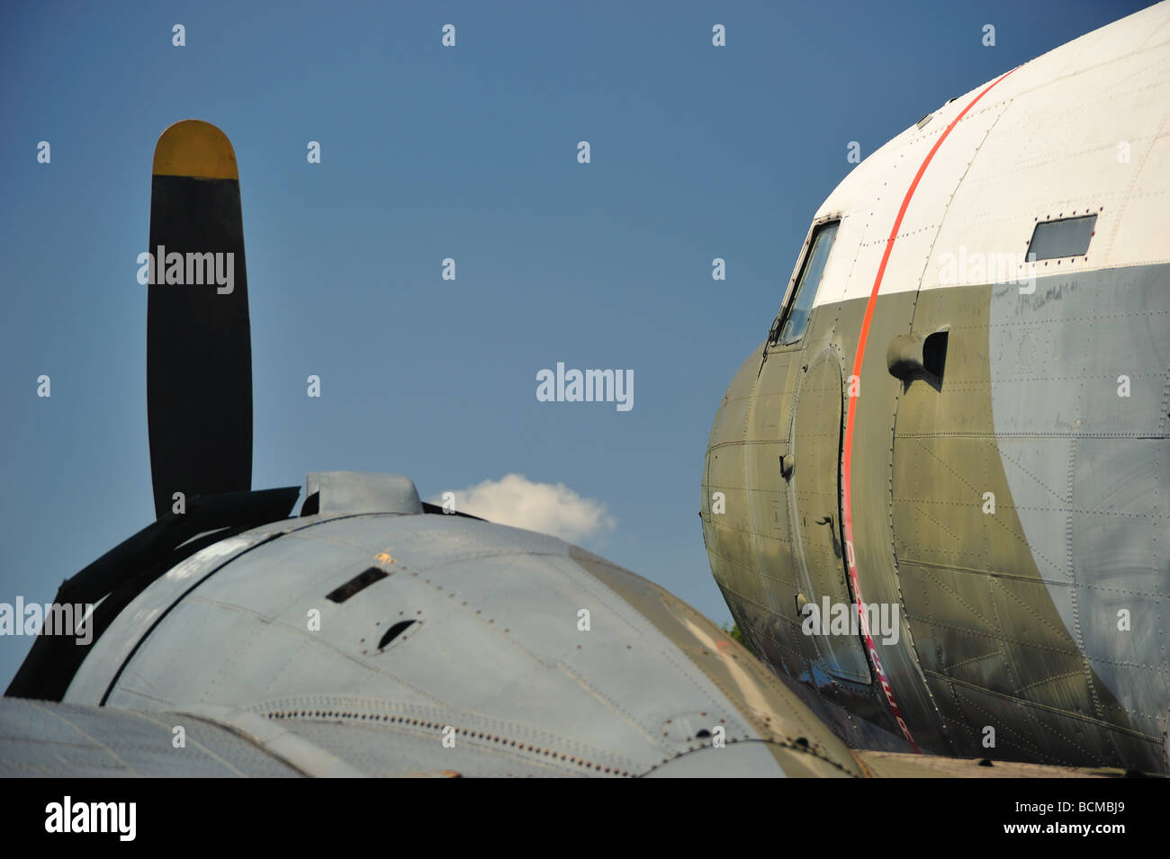 Military Douglas Skytrain C 47B Dakota airplane against a clear blue ...