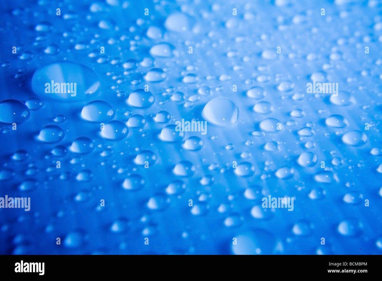 clean water drops macro shoot great for background Stock Photo - Alamy