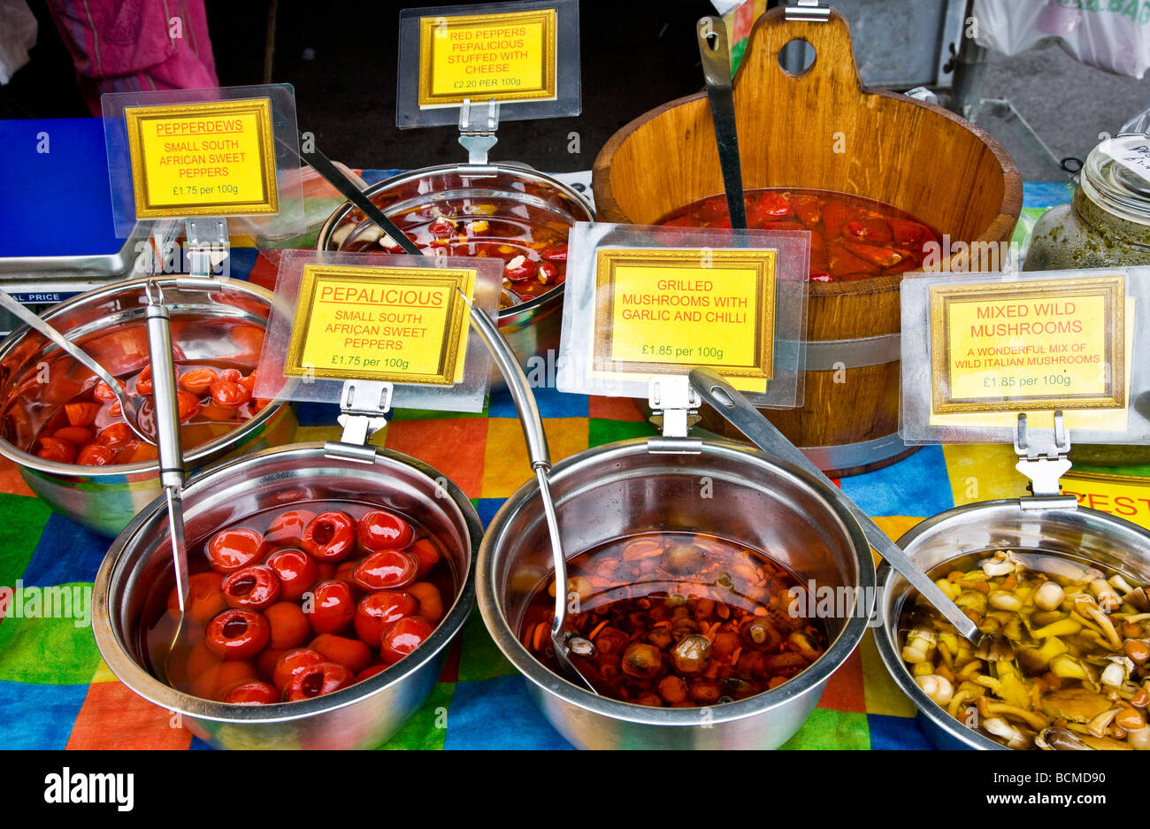 An olive stall at the Thursday farmer's market in the typical English ...