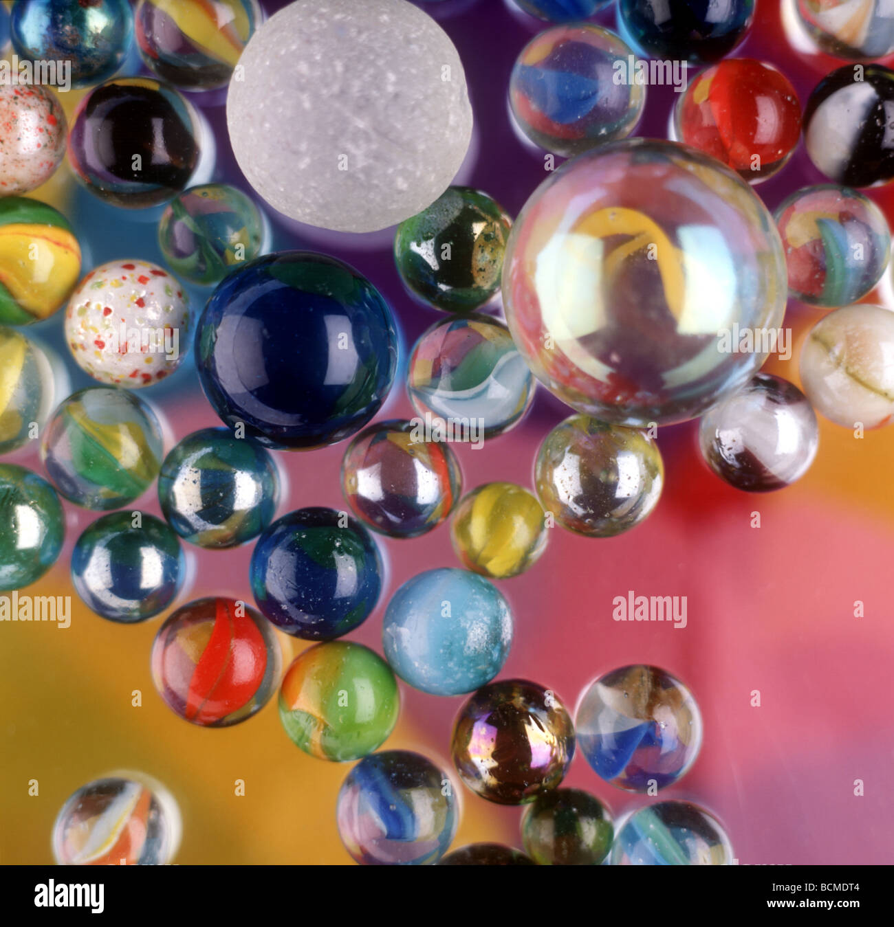 Kid playing marbles hi-res stock photography and images - Alamy