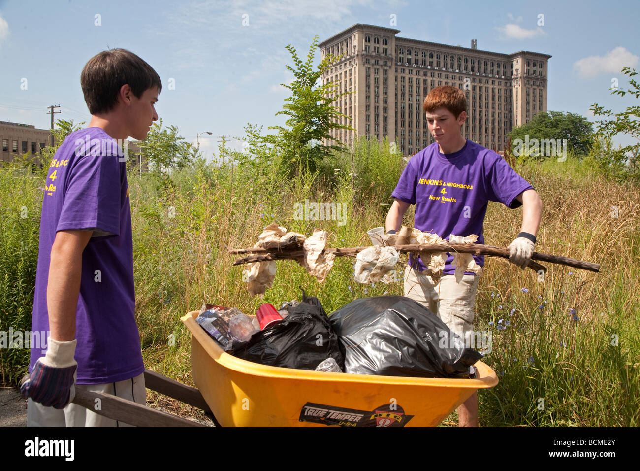 High School Volunteers Clean Trash from Alley Stock Photo - Alamy