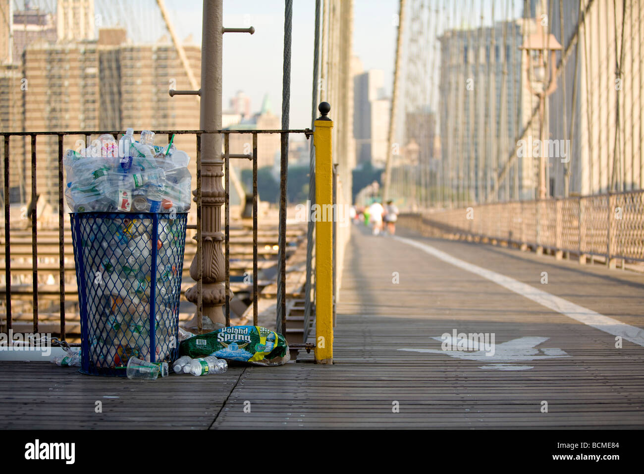 Garbage falling out of garbage can on Brooklyn Bridge, NY, USA 2008 ...