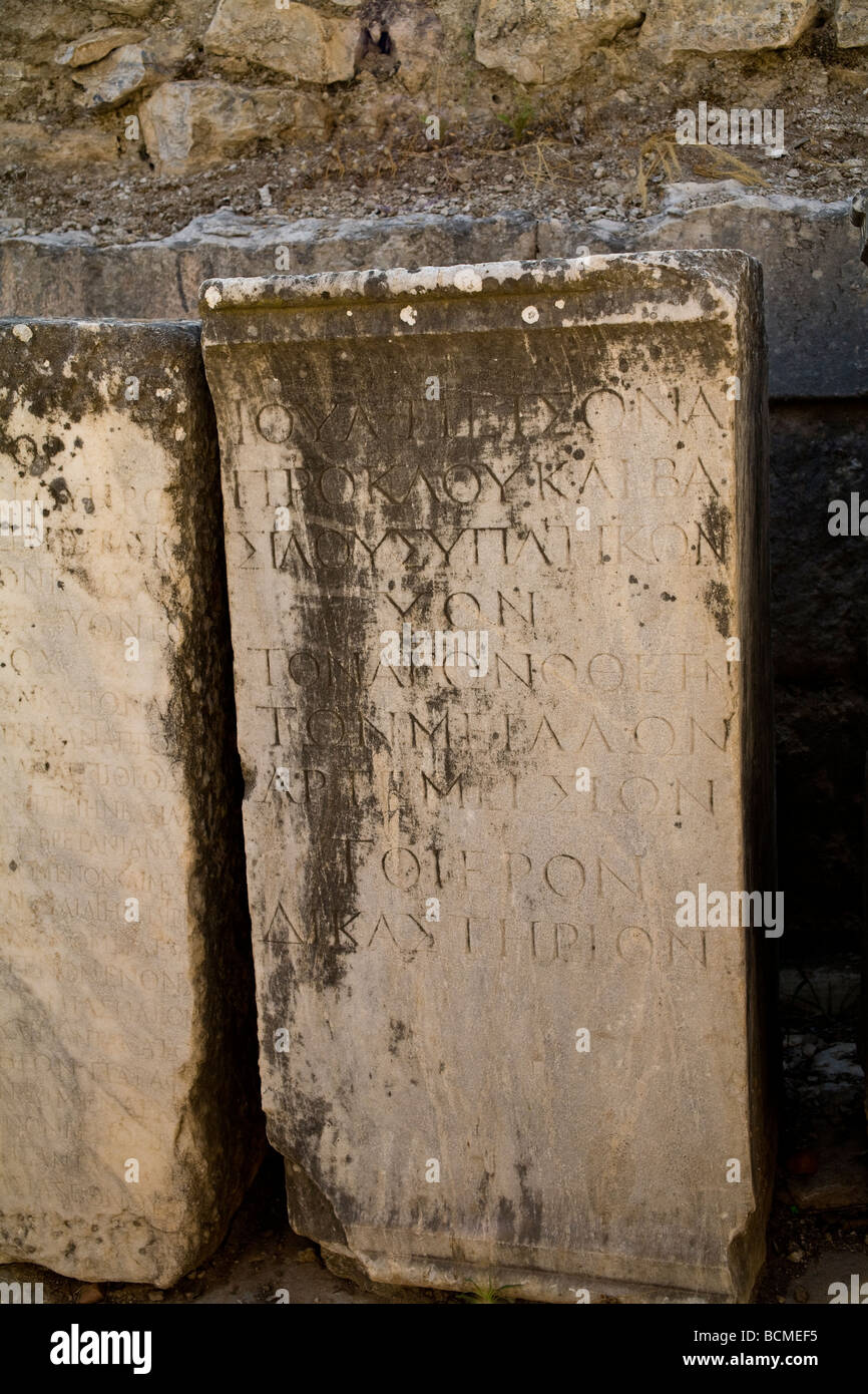 Words carved into stone along the Marble Road in Ancient Ephesus ...