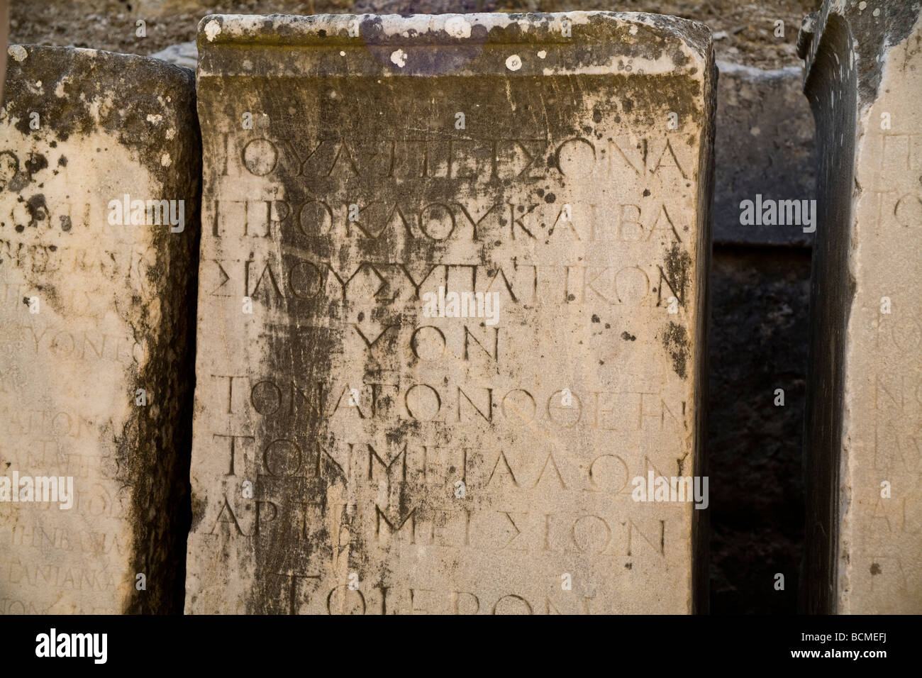 Words carved into stone along the Marble Road in Ancient Ephesus ...