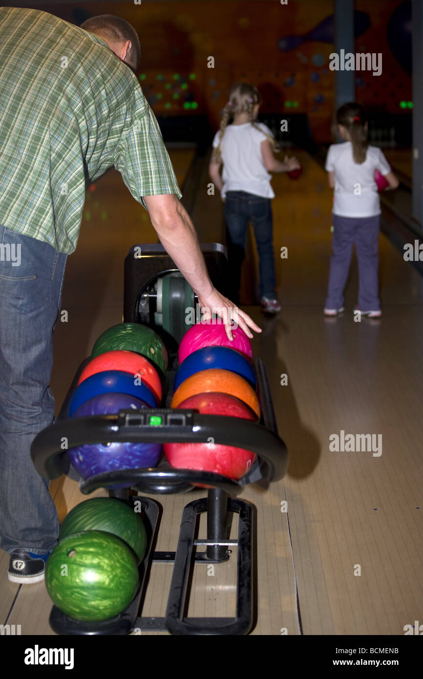 Young man going bowling Stock Photo - Alamy