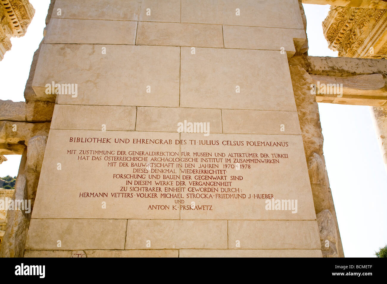 Engraved words on inside wall of Celsus Library Ephesus Stock Photo - Alamy