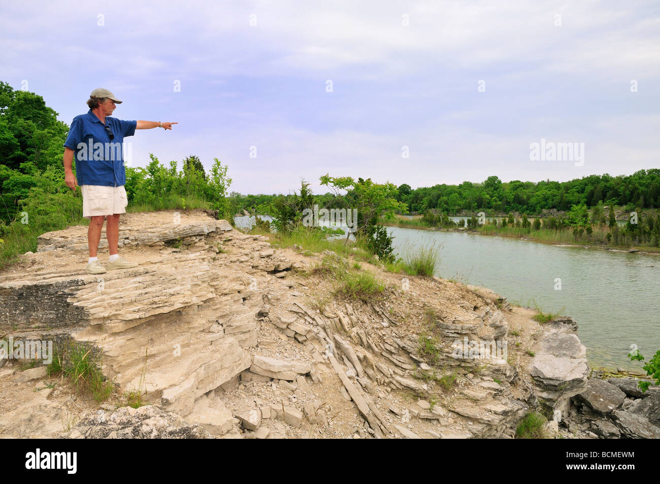 Pat Hayes points out a feature of a lake at the North Pond State Nature ...
