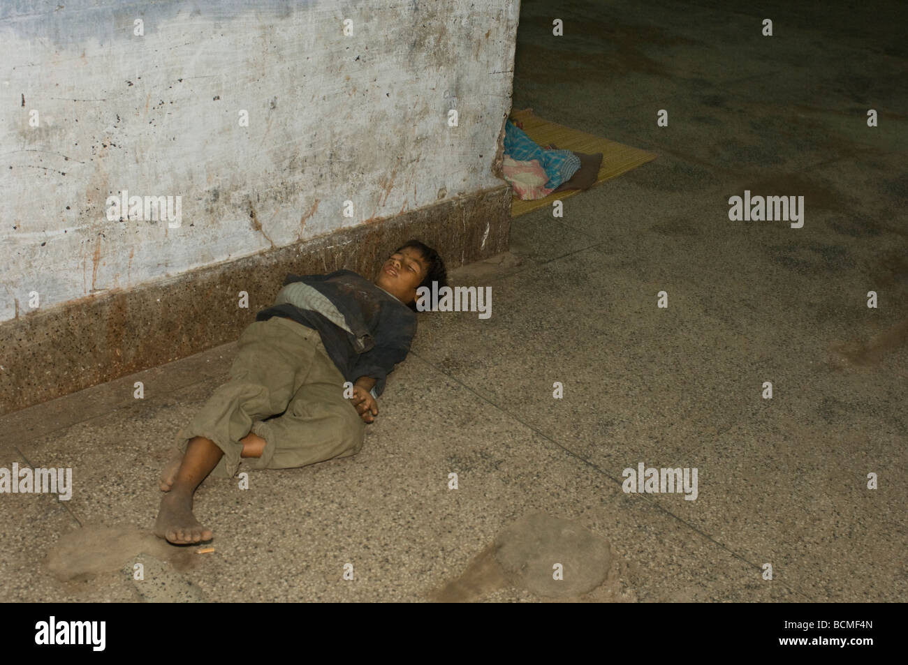 Homeless children street sleeping hi-res stock photography and images ...