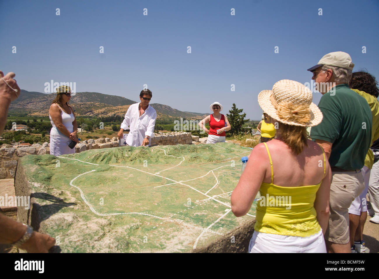 Tour guide explains geography of Ephesus Stock Photo - Alamy