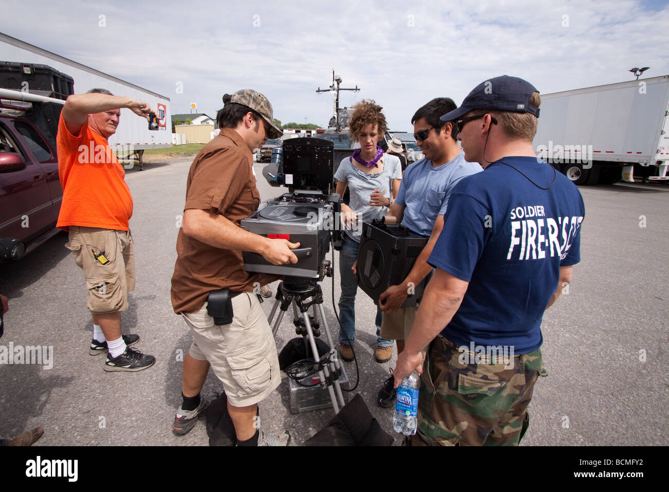 Sean Casey s IMAX team loads film into an IMAX camera during Project ...