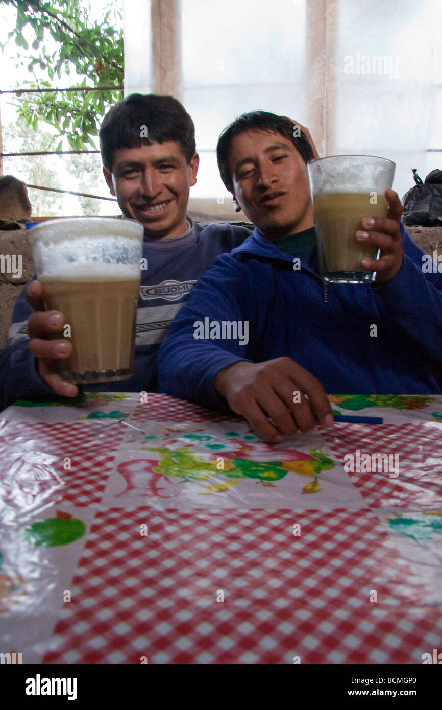 locals drinking chicha fermented drink in a chicharia Sacred Valley ...