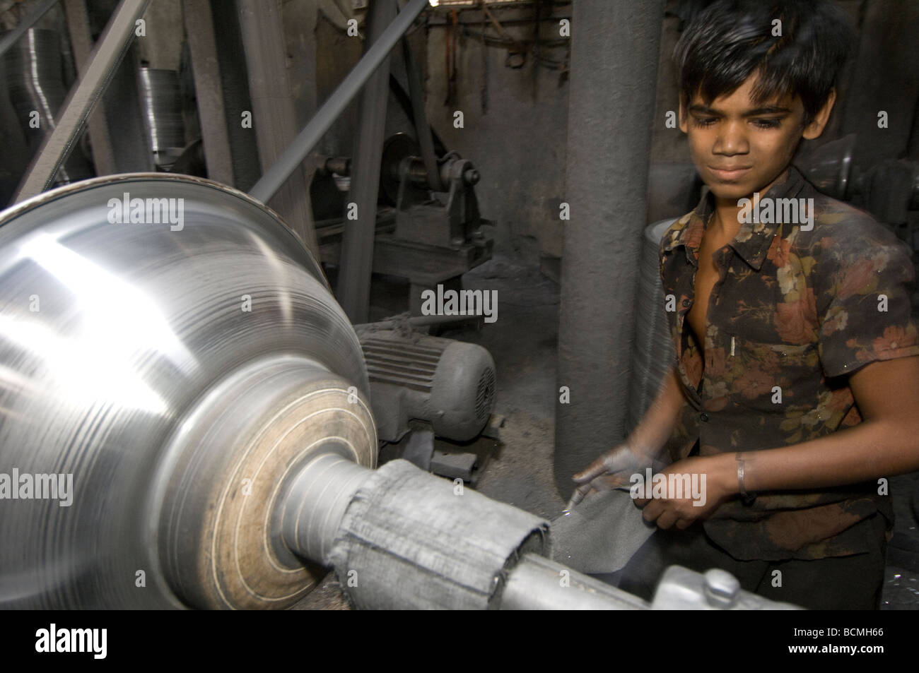 Dhaka child labour Metal turning factory Stock Photo - Alamy