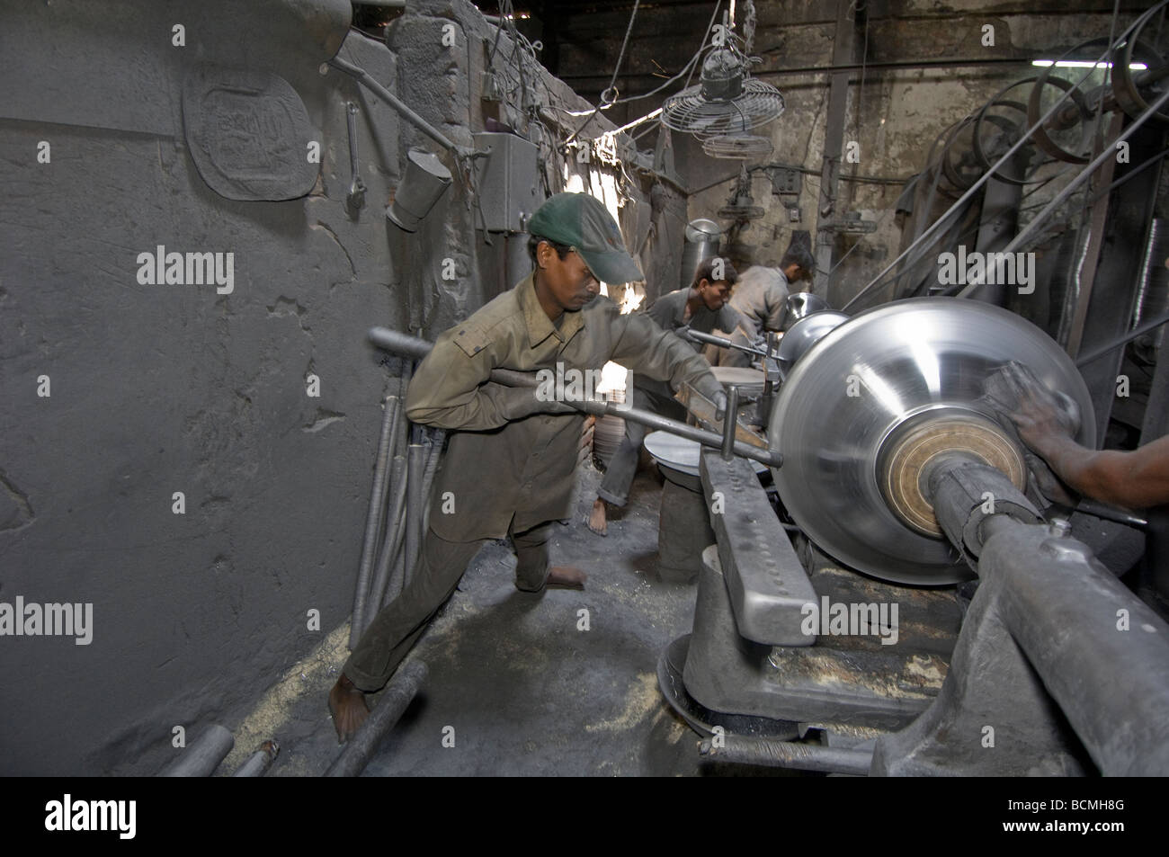 Dhaka child labour Metal turning factory Stock Photo - Alamy