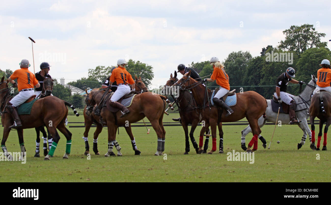 Riders playing polo Stock Photo - Alamy